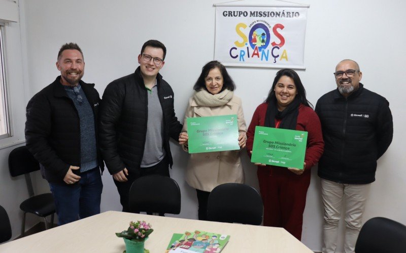 Sicredi Pioneira entrega placa simbólica do Fundo Social à SOS Criança ...